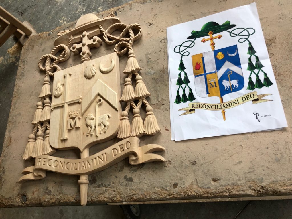 Custom carved coat of arms for Catholic bishop - Mazzolini Artcraft